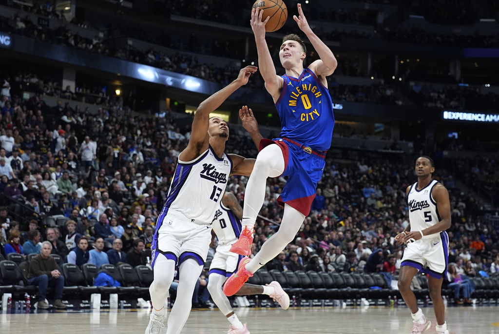 Nikola Jokic hits 66-foot heave to highlight his 5th straight triple ...