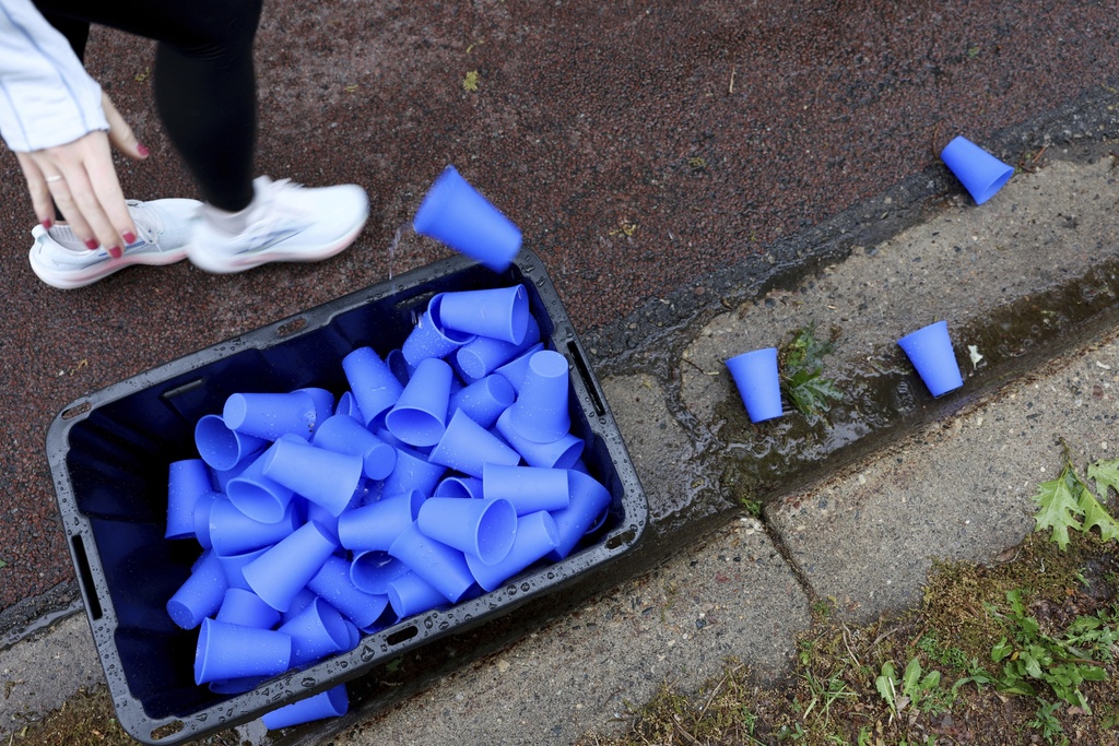 This runner was bothered by blizzard of disposable cups at races. She ...