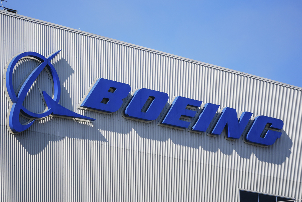 Thousands of Boeing workers who build fighter jets go on strike ...
